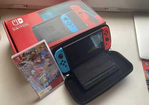 Nintendo Switch + Mario Odyssey + Mario Cart Delux