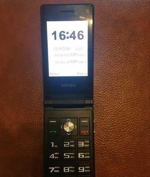 Uniwa x28 раскладной телефон почти новый