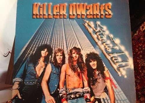 Killer dwarfs "stand tall" 1986