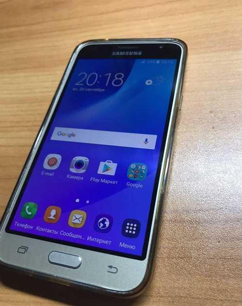 Телефон Samsung J320