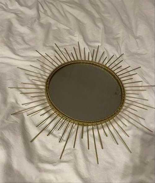 Настенное зеркало в виде солнца