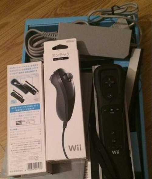 Nintendo Wii + Sport Pack