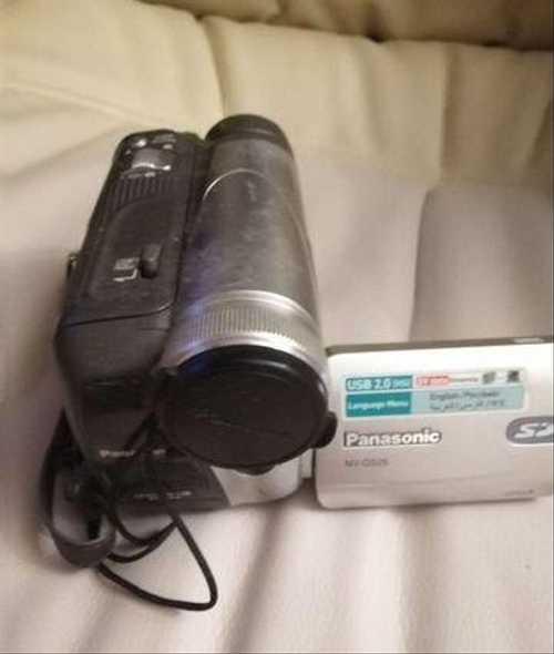Видеокамера Panasonic и фотоаппарат Canon