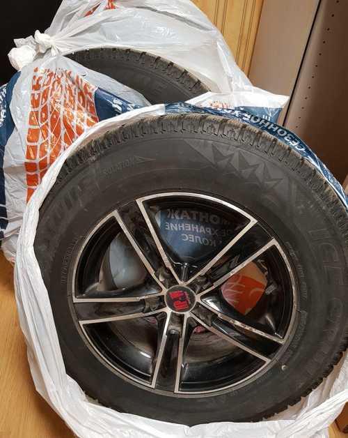 Шины 215/70 R16 Bridgestone на дисках NP-W crystal