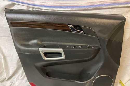 Обшивка двери Opel Antara