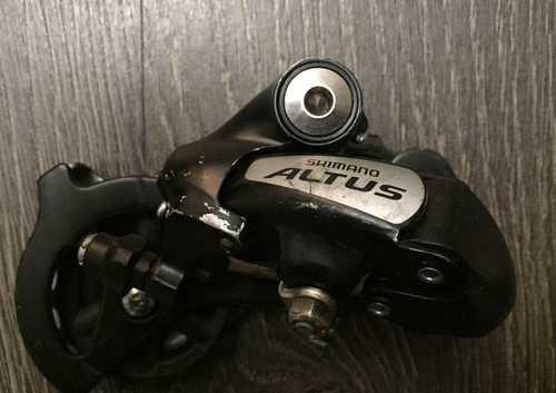 Задний переключатель Shimano Altus