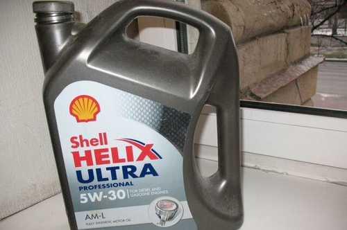 Helix ultra am l. Шелл Хеликс ультра 5w30 золотистая канистра артикул. Моторное масло в золотистой канистре. Масло Helix am-l для машины.
