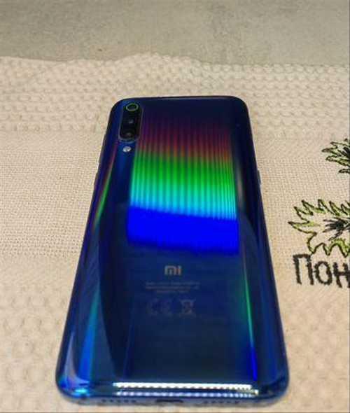 Продам смартфон Xiaomi MI9 64Gb синий