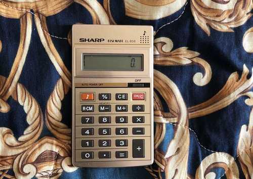Маленький, карманный калькулятор sharp