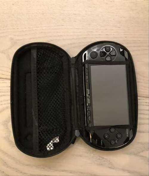 Sony PSP 1008 + чехол и 8 игр