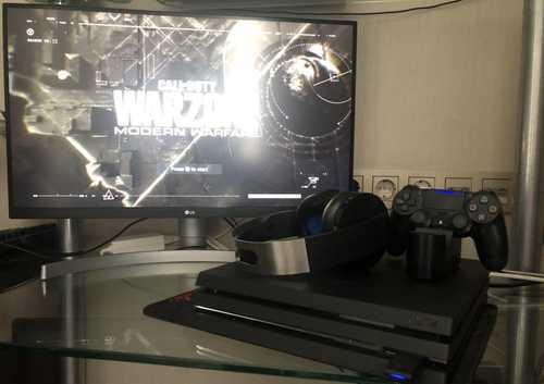 PlayStation 4 PRO 1TB + Platinum Wireless Headset