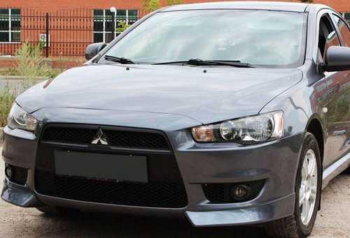 Клыки на передний бампер Mitsubishi Lancer X
