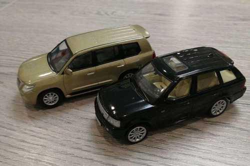 Модели автомобилей lexus LX 570 и range rover spor