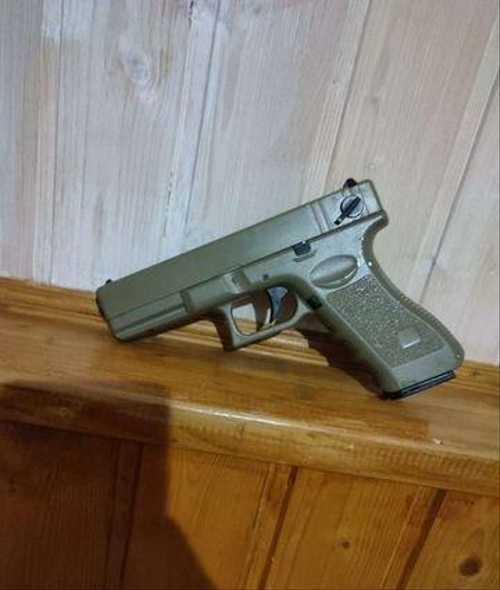 Пистолет страйкбольный Glock 17 Cyma