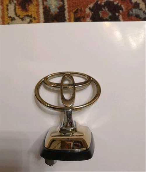 7530360080 toyota эмблема металл золото