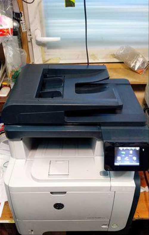 Мфу лазерное HP LaserJet Pro M521dn