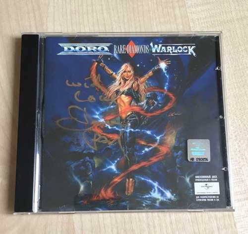 Автограф Doro Pesh на CD Warlock Доро Пеш