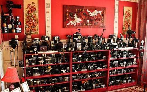 Большая коллекция фотоаппаратов и объективов 90шт