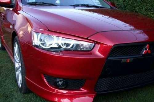 Клыки бампера Lancer X оригинал черный цвет