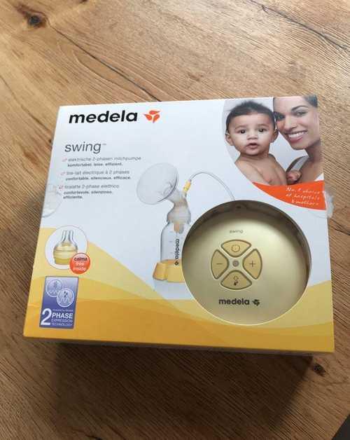 Молокоотсос Новый medela