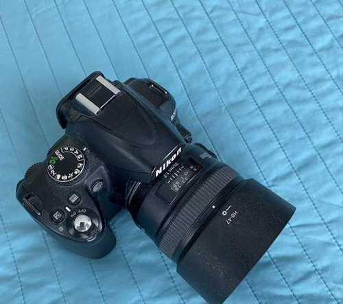 Зеркальный фотоаппарат Nikon d3000 тушка + фикс 35