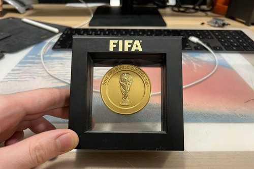 Медаль fifa 2018