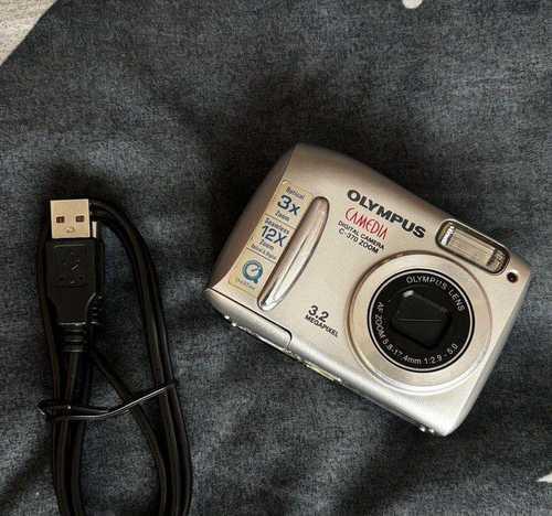 Цифровая мыльница Olympus C-370 с примерами