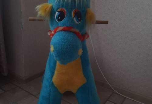 Конь качалка
