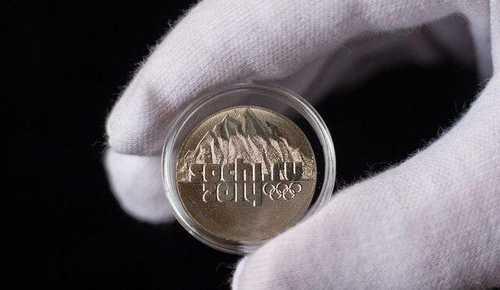Памятная монета 25 рублей в капсуле Эмблема. Зимни