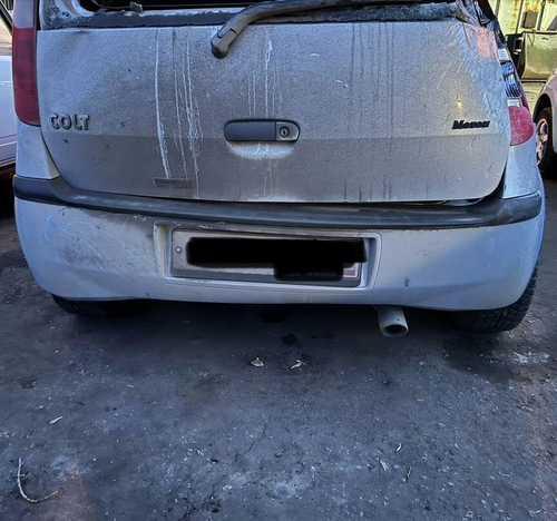 Задний бампер Mitsubishi Colt
