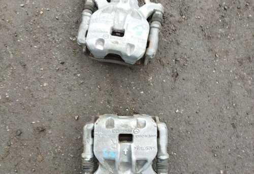 Суппорт тормозной задний Mazda 3 (BM/BN)