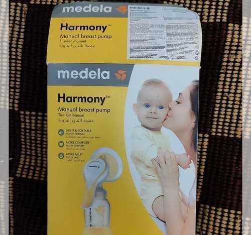 Набор Medela молокоотсос + бутылочка с соской