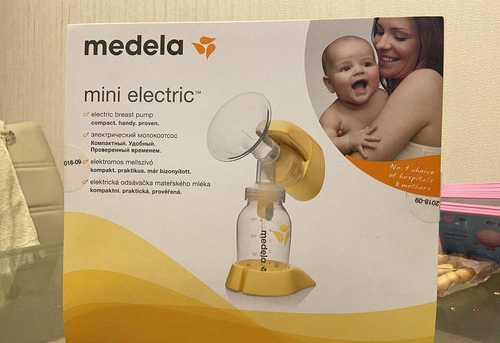 Молокоотсос medela электрический