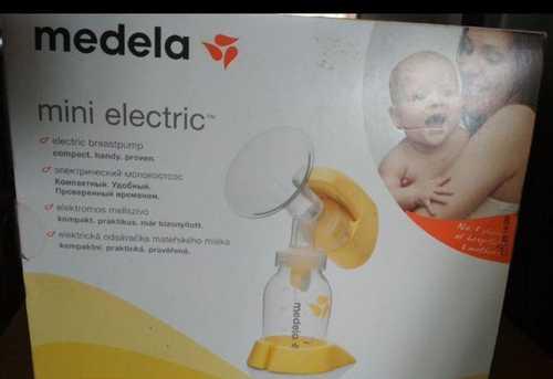 Молокоотсос medela электрический