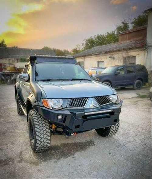 Передний бампер Мицубиси л200 2006-13 revo
