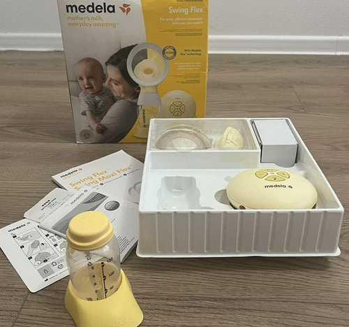 Молокоотсос medela электрический swing flex