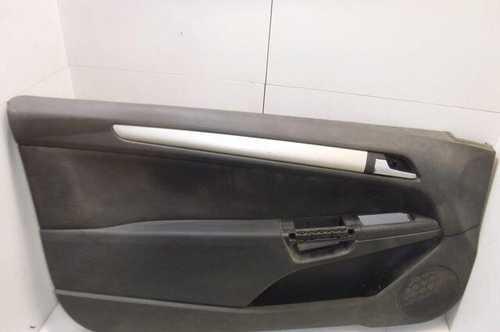 Обшивка двери передней Opel Astra H