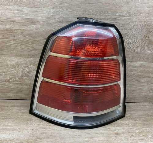 Фонарь левый Opel Zafira B дорестайлинг 112123