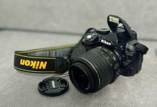 Зеркальный фотоаппарат Nikon D3100 с объективом
