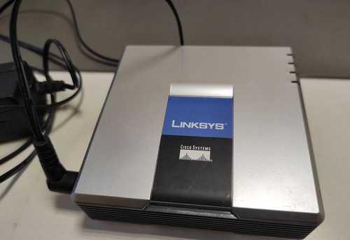 Телефонный адаптер и роутер Linksys SPA2102