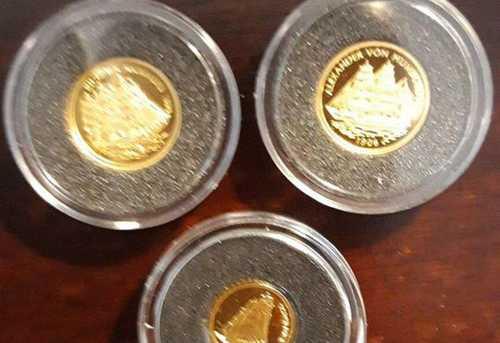 Золотые монеты корабли. Бенин. Либерия