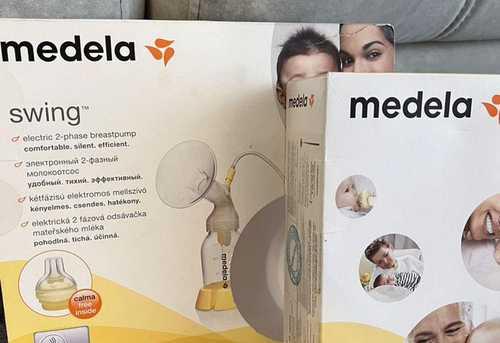 Молокоотсос электрический Medela и бутылочки