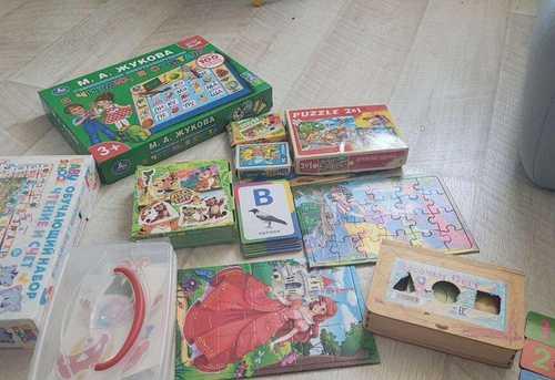 Развивающие игрушки и книги для малышей пакетом