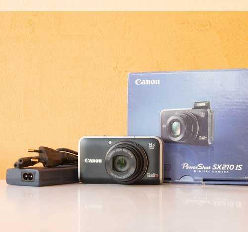 Цифровая мыльница Canon Powershot SX210 IS   приме