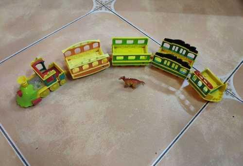 Поезд динозавров с вагонами и динозавриком
