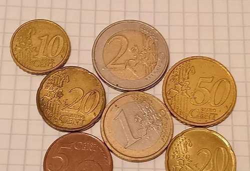 Монеты цент и евро