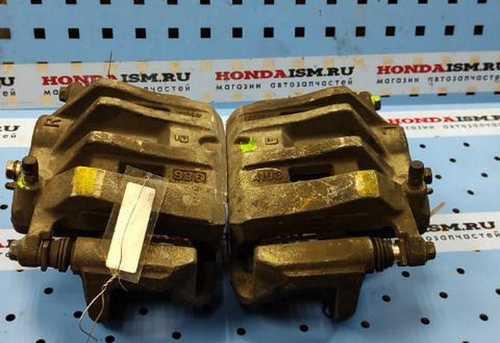 Суппорт тормозной передний левый Honda Accord 8