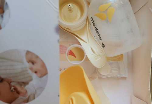 Молокоотсос medela ручной Harmoni