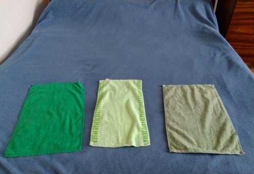 Зелёные хорошые новые полотенца