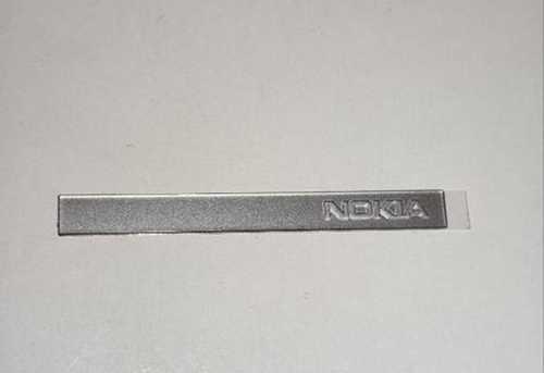 Nokia 7360 вставка боковая логотип Nokia silver